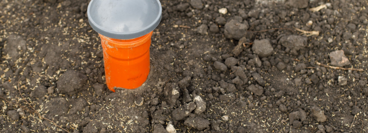 Sewer ventilation. Septic vent, plastic pipe up on ground. Construction ...